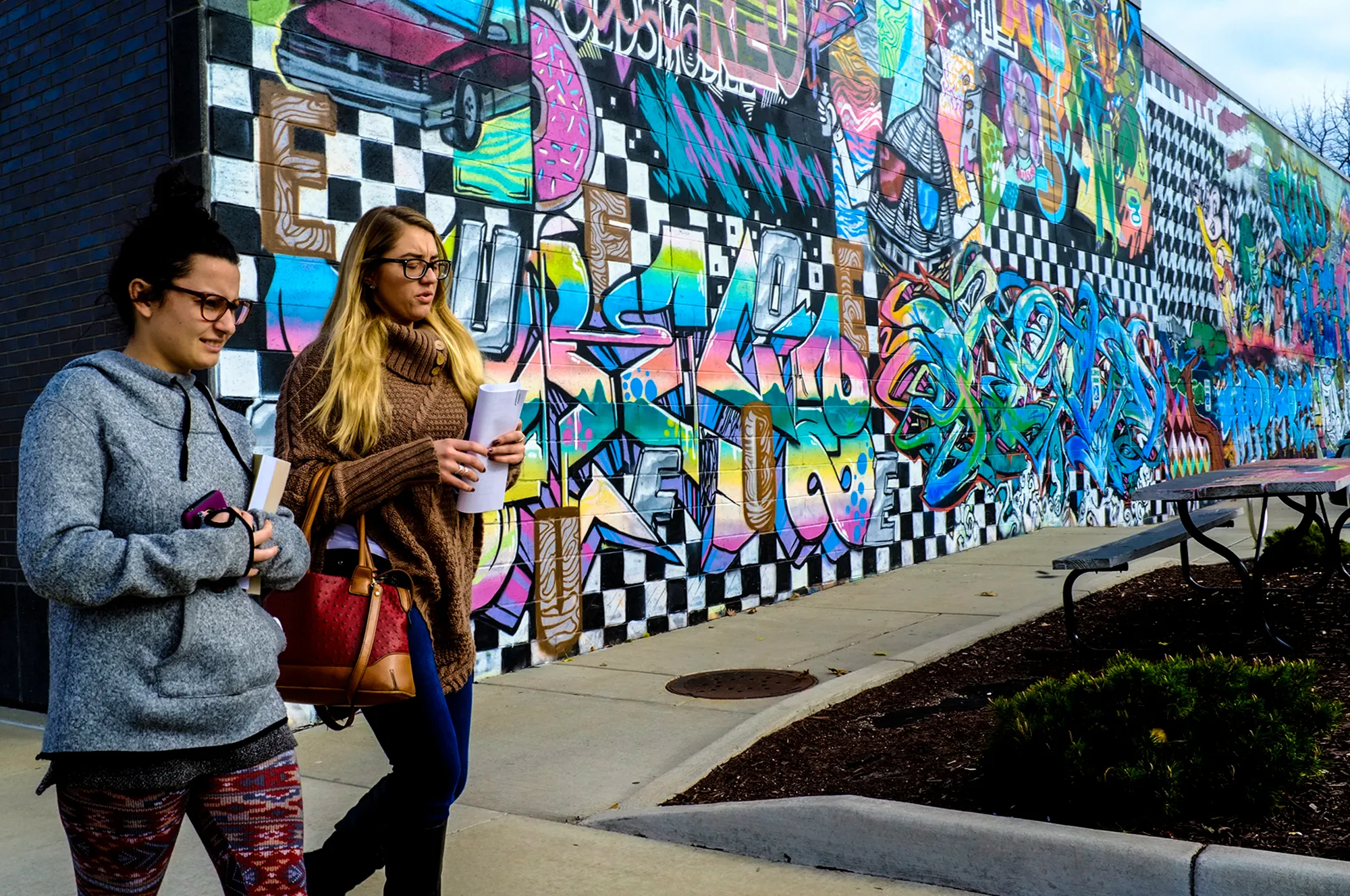 Painting the town: The stories and artists behind Lansing’s murals ...